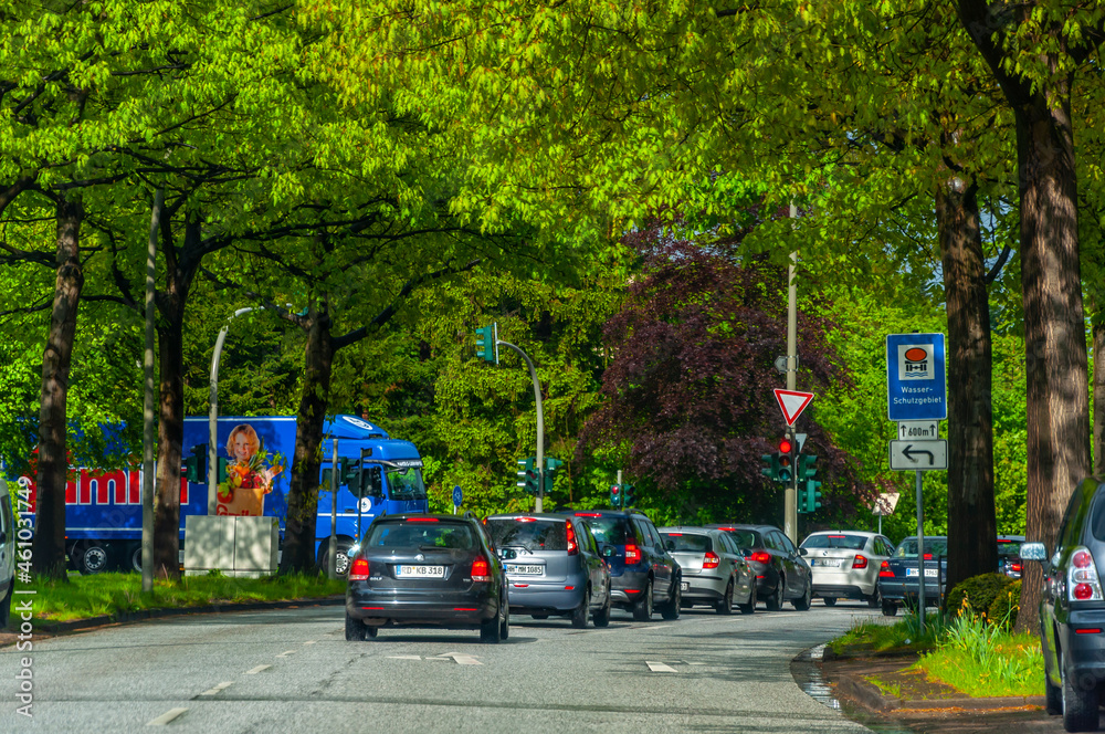 Cars stop in the line on crossroads for red traffic light Stock Photo ...
