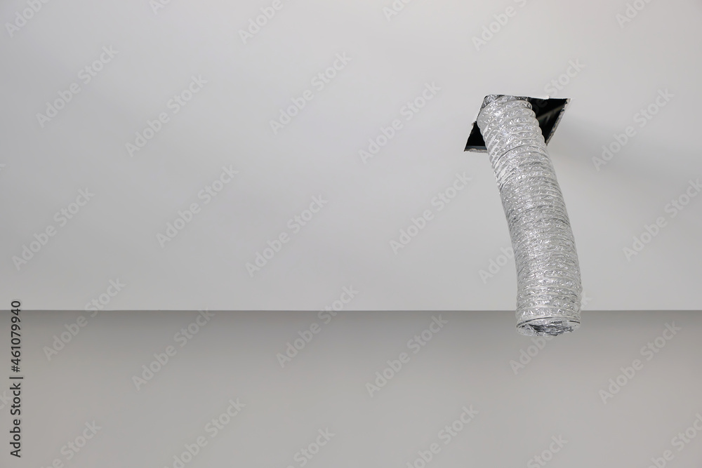 Installation of ventilation ducts under the ceiling covered with ...