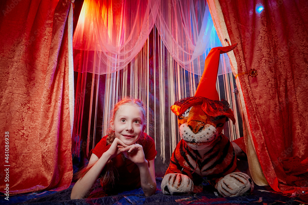 Young teenager girl during a stylized theatrical circus photo shoot in ...