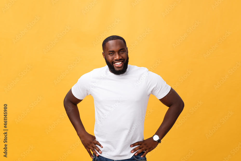 Portrait of a modern young black man smiling standing on isolated ...