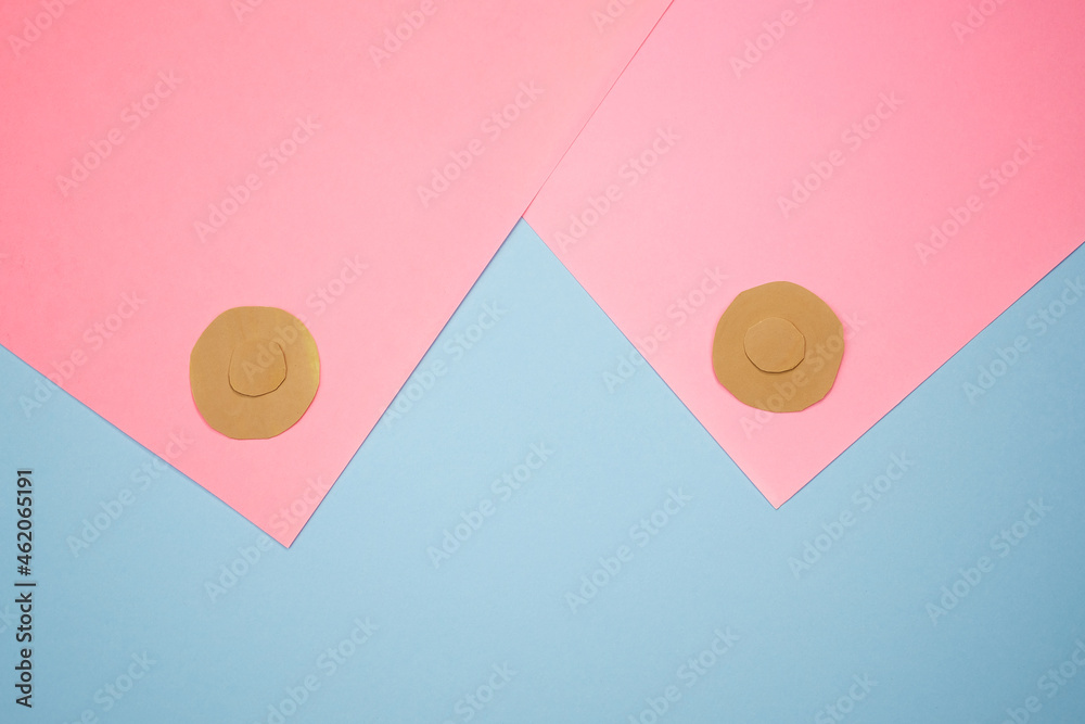 Paper application on a woman's theme. The female breast is stylized ...