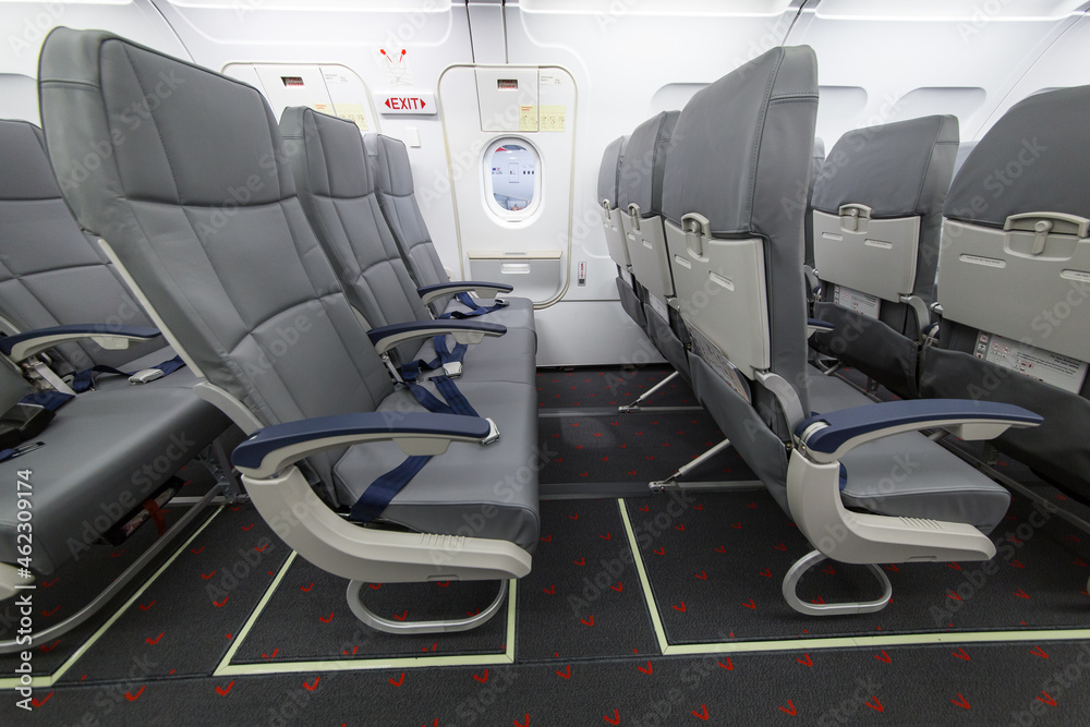 Inside view of emergency exit row in commercial passenger aircraft ...