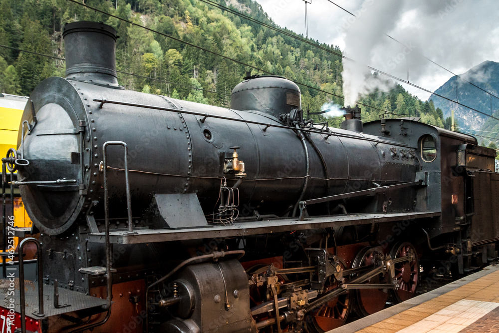 Old fashioned train vagon and Steam locomotive in the station of ...
