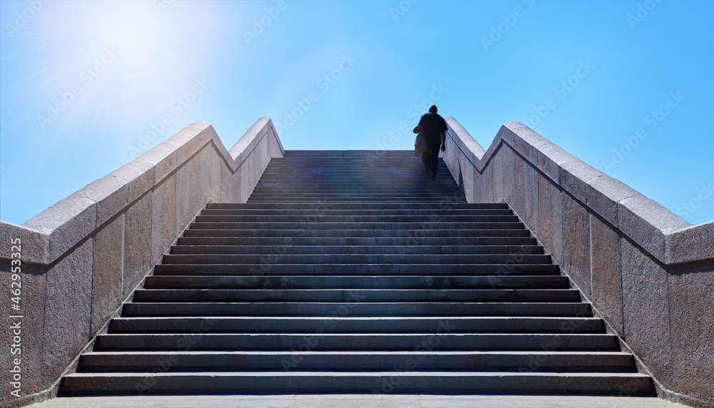 Man climbing the wide granite stairs. Walking man to target. Concept to ...