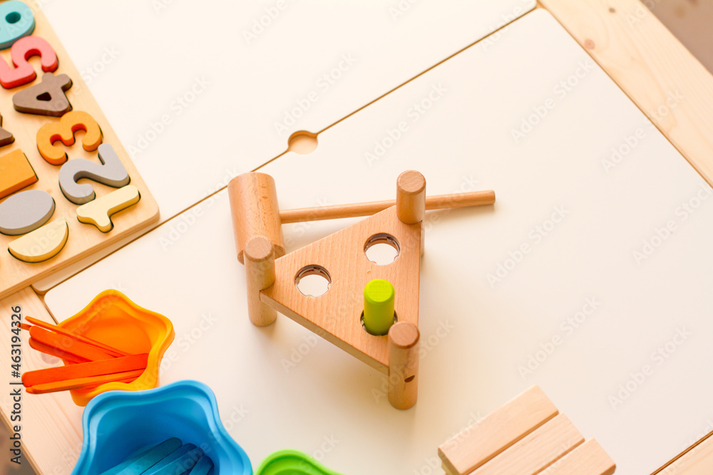 Wooden toys for an early age. Educational logic games: hammer, numbers ...