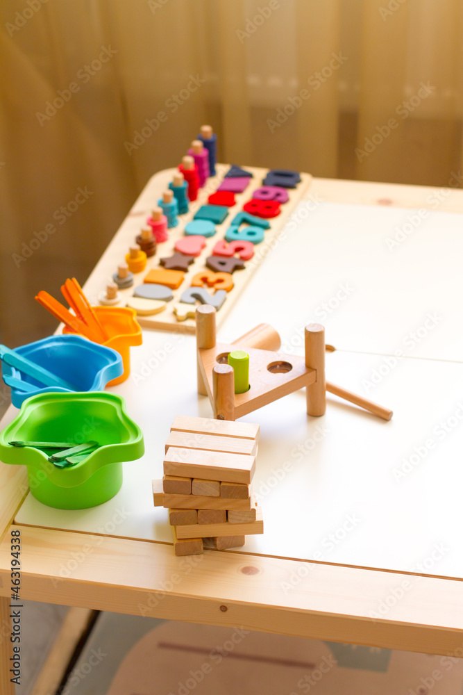 Wooden toys for an early age. Educational logic games: hammer, numbers ...