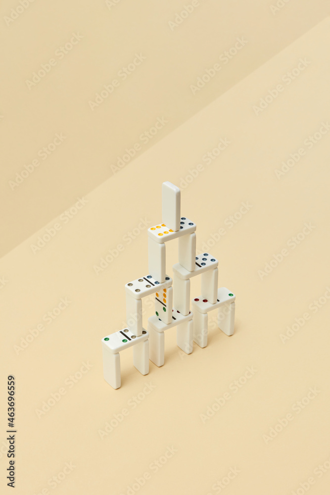 Dominoes pyramid Stock Photo | Adobe Stock