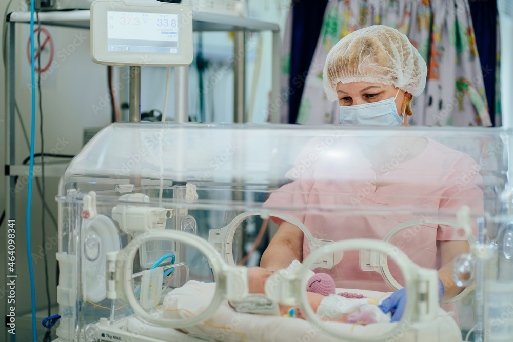 Newborn is placed in the incubator. Neonatal intensive care unit ...