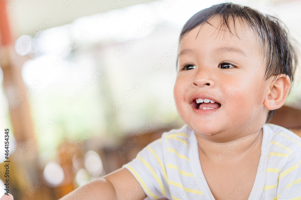 Happy asian boy child showing front teeth with smile and laughing ...