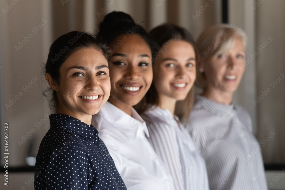 Multi ethnic group of successful confident women office workers ...