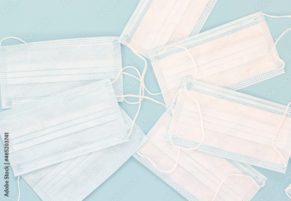 Hospital masks on a blue background. Medicines and fruits lie Stock ...