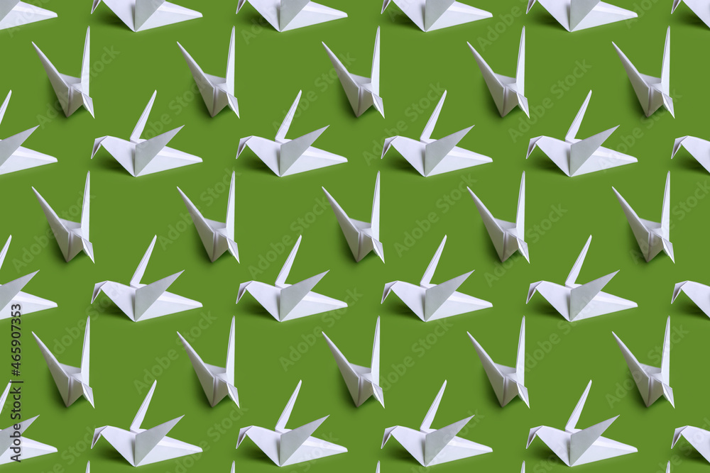 Seamless background with paper cranes. White paper birds on a plain ...