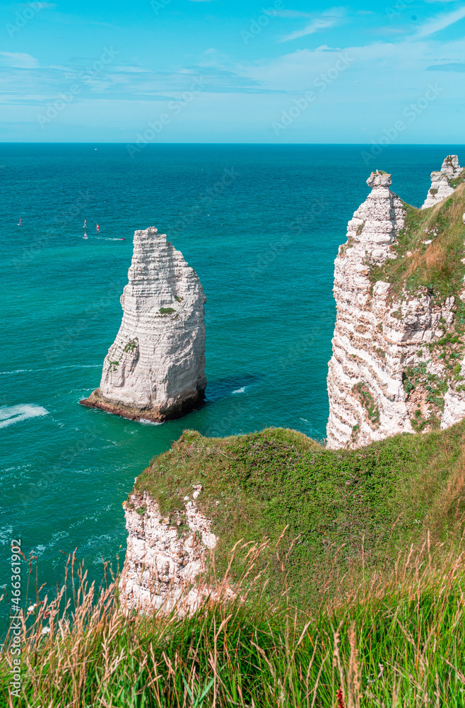 Etretat is best known for its chalk cliffs, including three natural ...