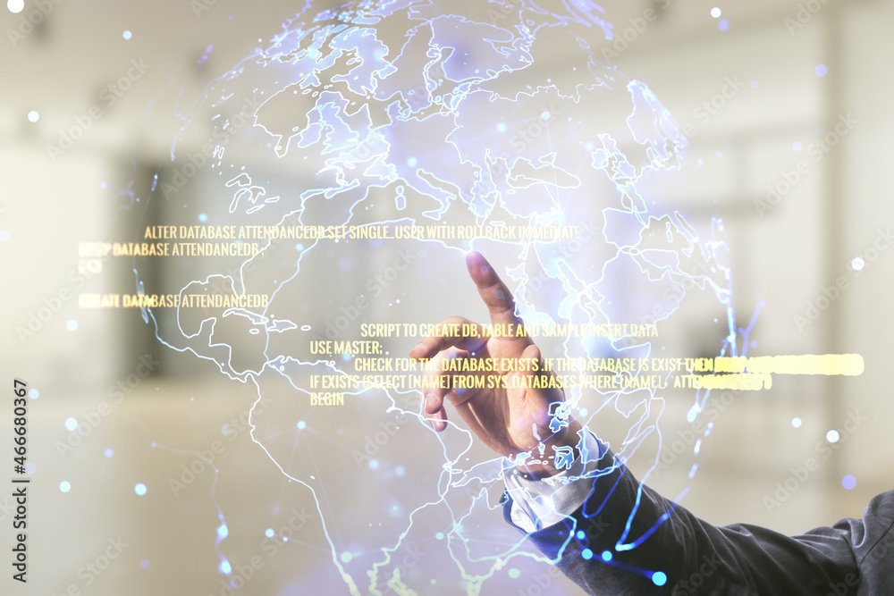 Multi exposure of programmer's hand working with abstract creative ...