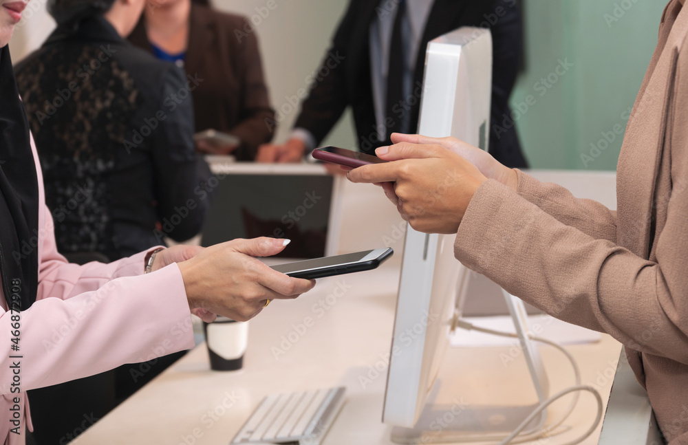Closeup of woman making payment transaction with mobile phone. Stock ...