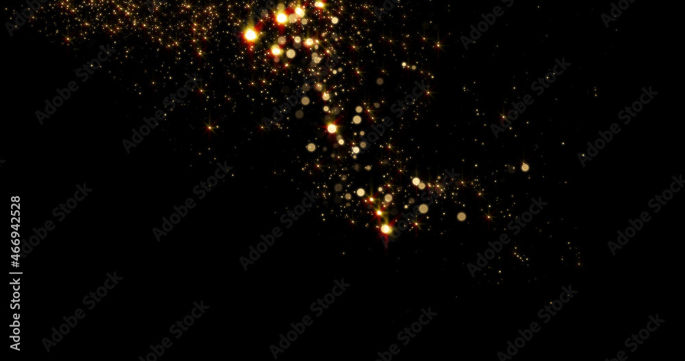 Gold particles fluid with light glitter and golden sparkles glow on ...