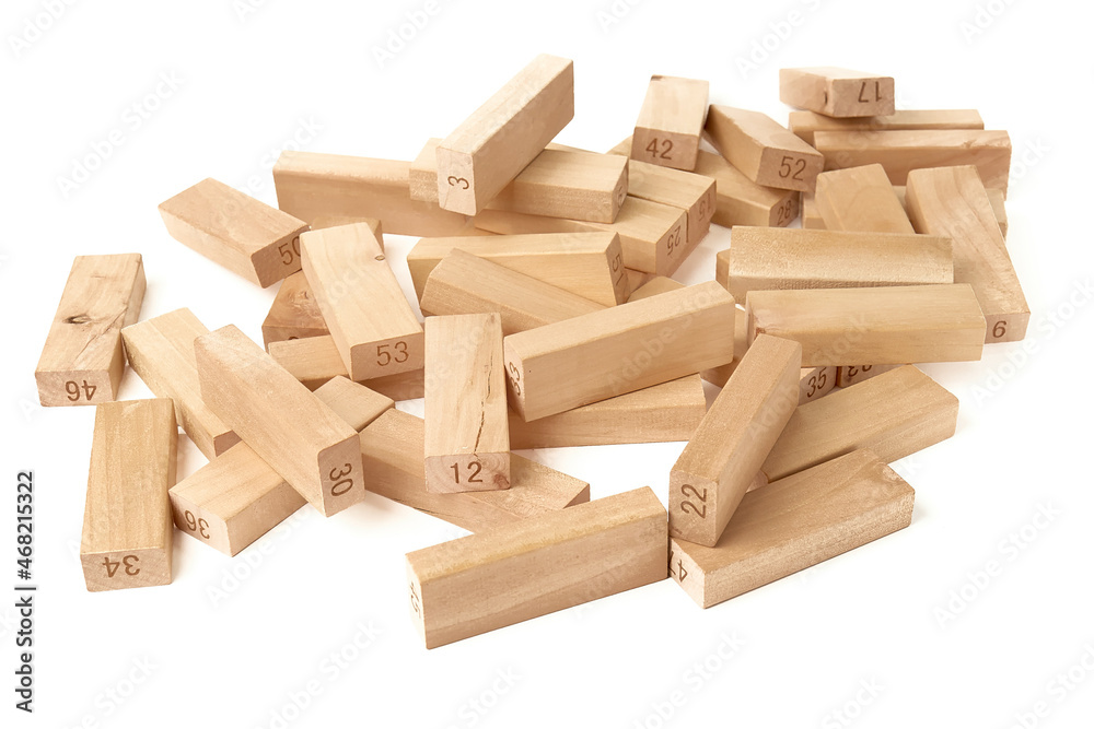 Numbered wooden blocks of the Jenga Tower board game on a white ...
