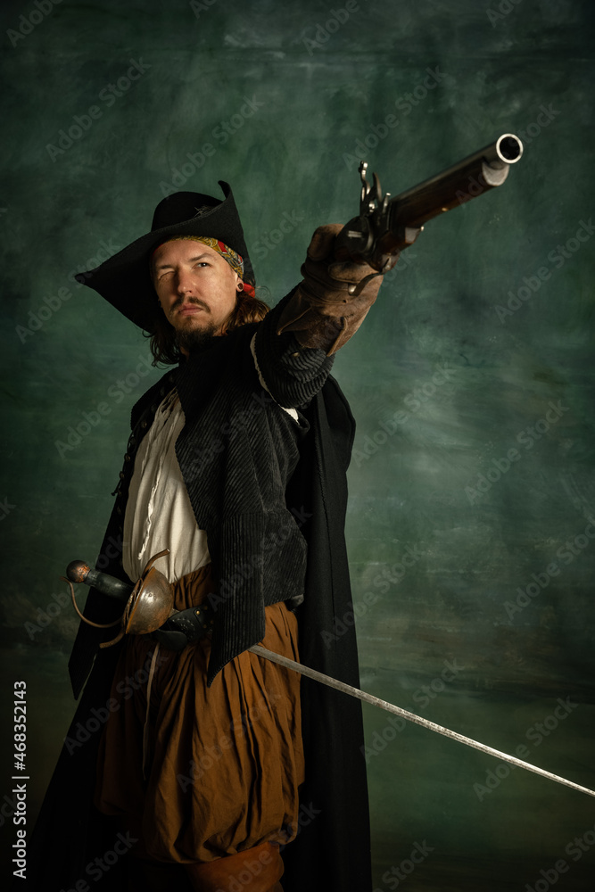 Cropped portrait of brutal frightening man, medeival pirate in vintage ...