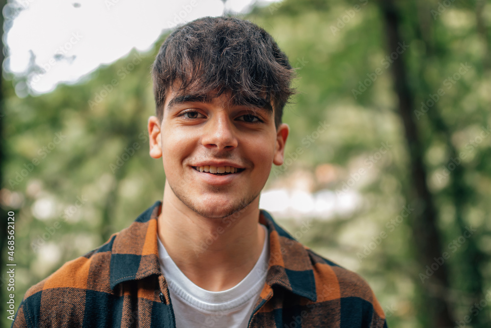 portrait of teenage boy outdoors Stock Photo | Adobe Stock