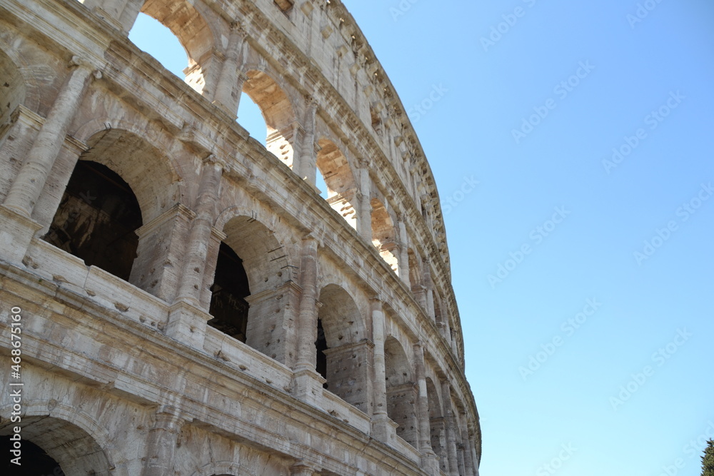 coliseum in rome italy showing old architecture in brown tones with ...