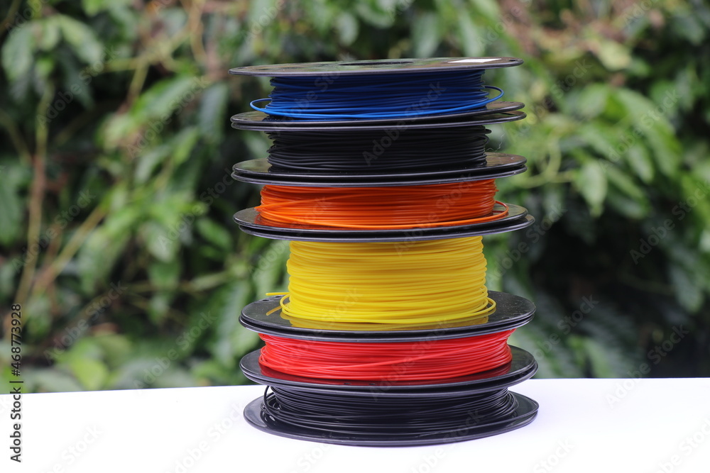 Stack of plastic filaments in a spool used for rapid prototype ...