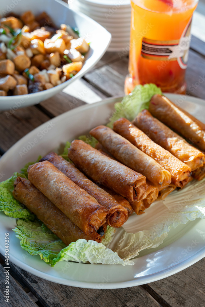 fried lumpiang togue is a common dish in the Philippines that consist ...