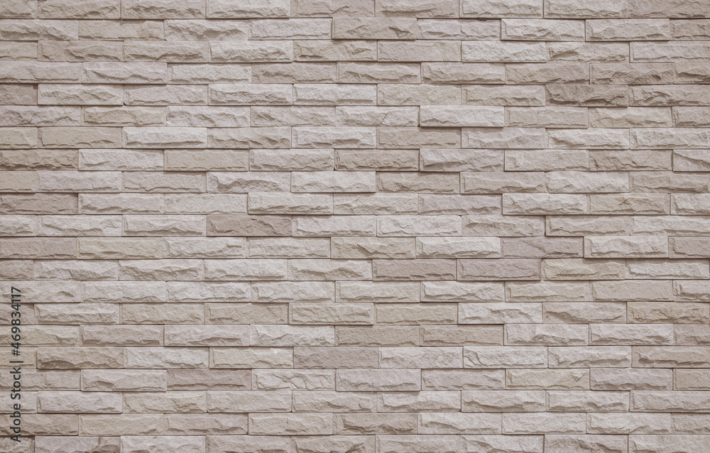 Cream and beige brick wall texture background. Brickwork and stonework ...