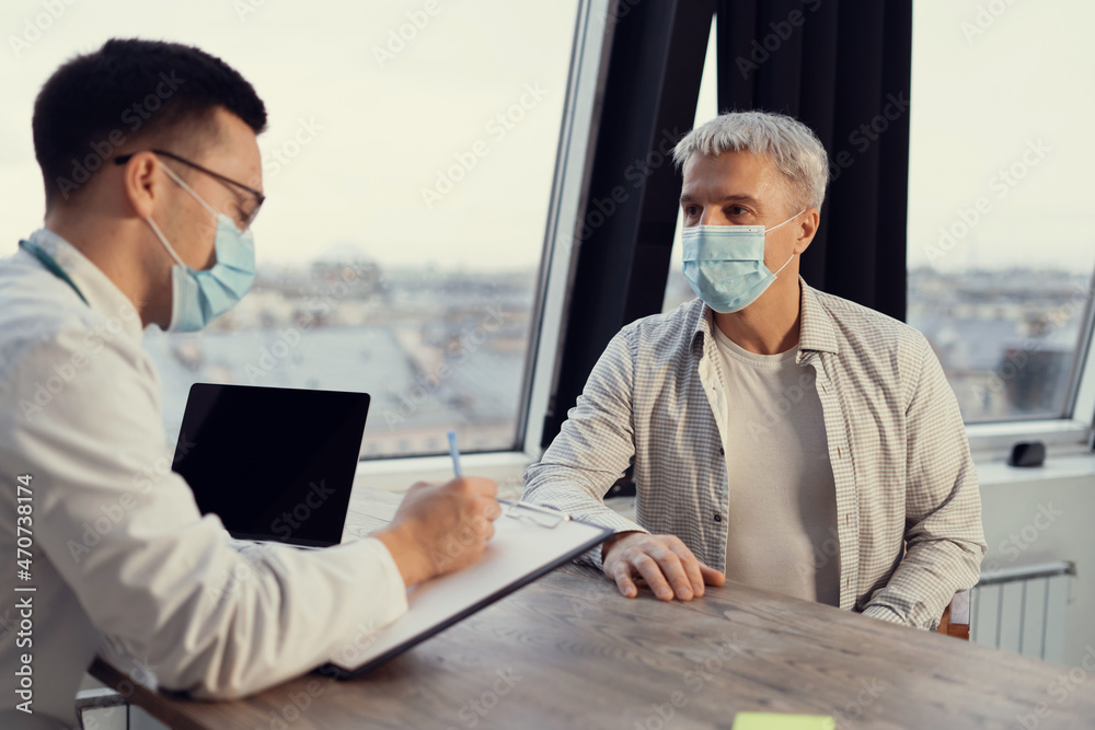 Consultation visit to a medical office. Male client at the clinic. The ...