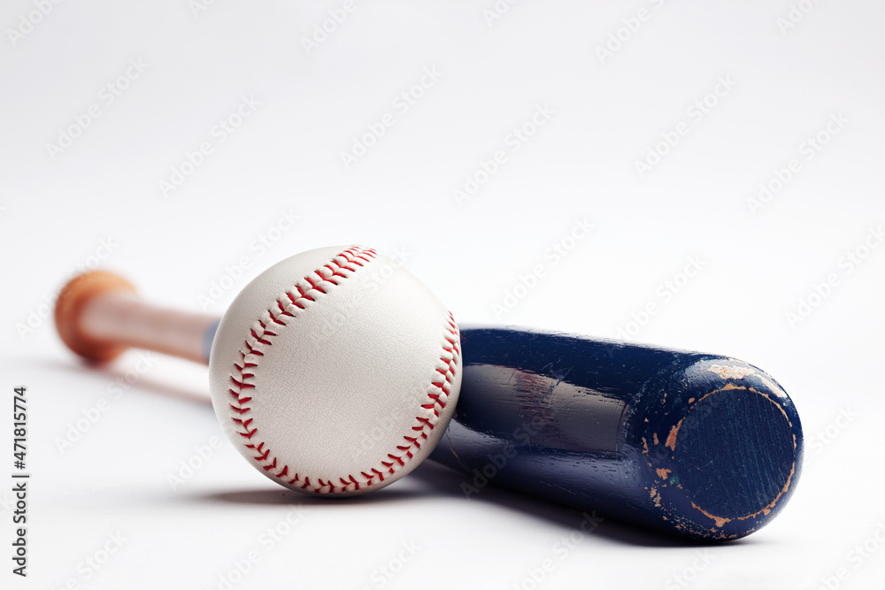 Baseball ball and blue wooden bat on white background with copy space ...