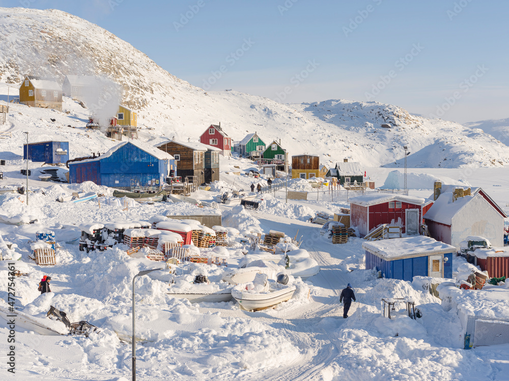 The traditional and remote Greenlandic Inuit village Kullorsuaq located ...