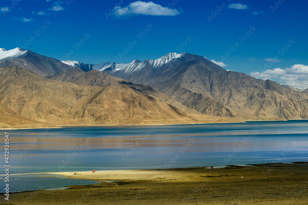 Mountain reflection on Pangong tso (Lake). It is huge lake in Ladakh ...