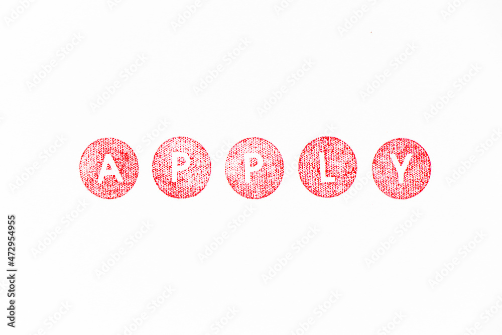 Red color rubber stamp in word apply on white paper background Stock ...