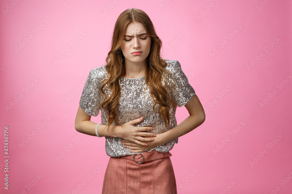 Portrait party girl feel painful stomachache stooping bending pain ...