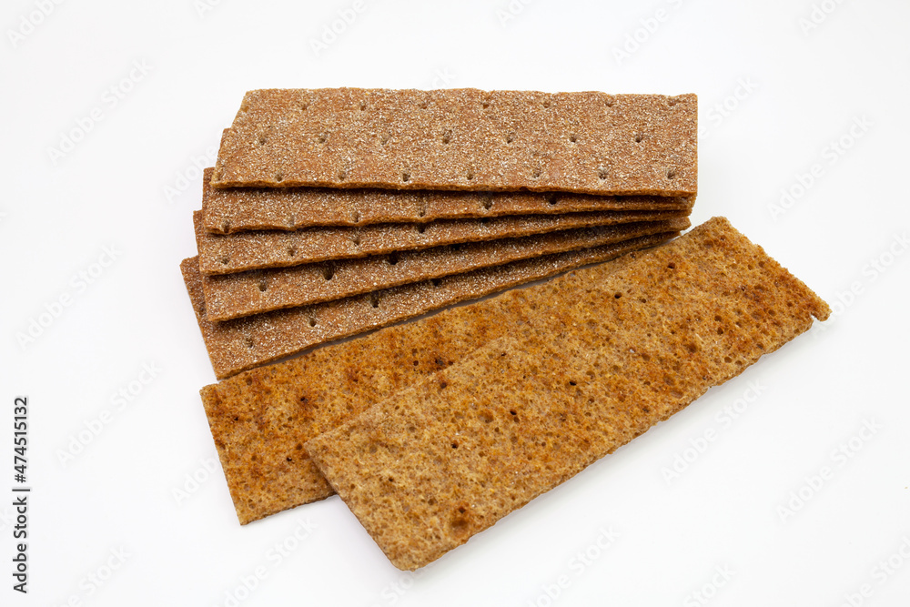 Stack of thin, crispy wholegrain rye breads isolated on white ...