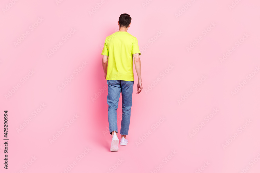 Full length body size back view photo man in casual outfit walking ...