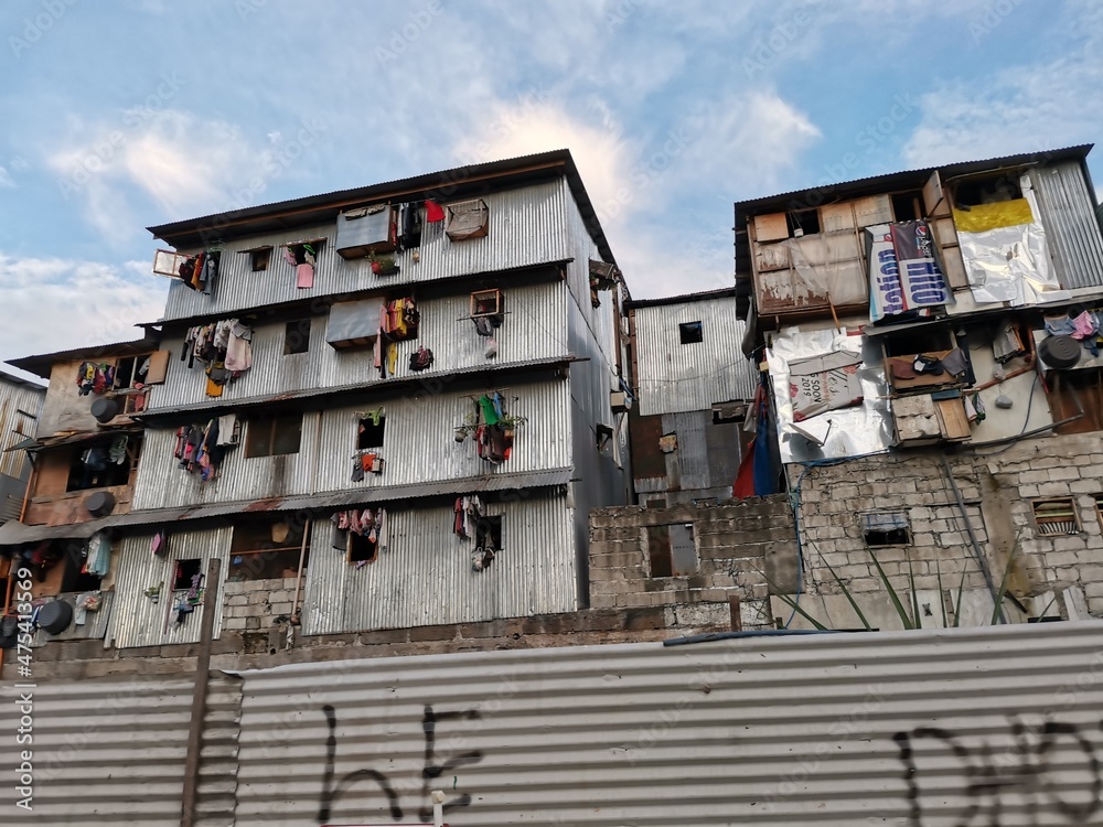 Poor Families Live in Row Houses Made of Metal Roofing Sheets Stock ...