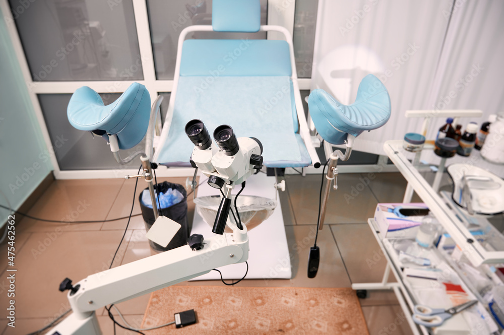 Interiors of gynecological cabinet with optical instrument for ...