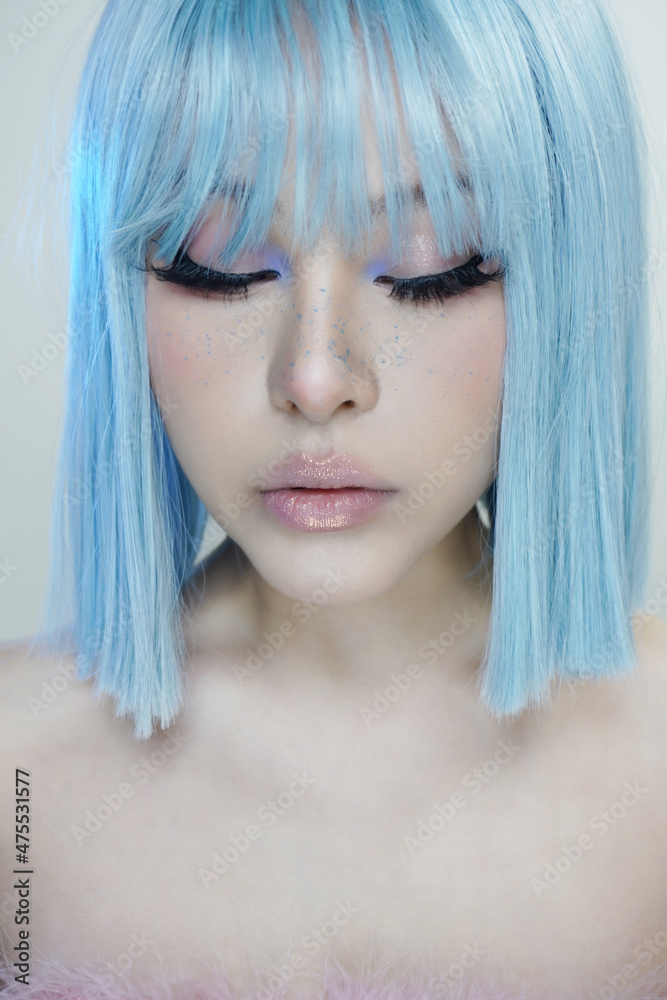 Pretty Asian girl with blue hair represents the LGBT community. She has ...