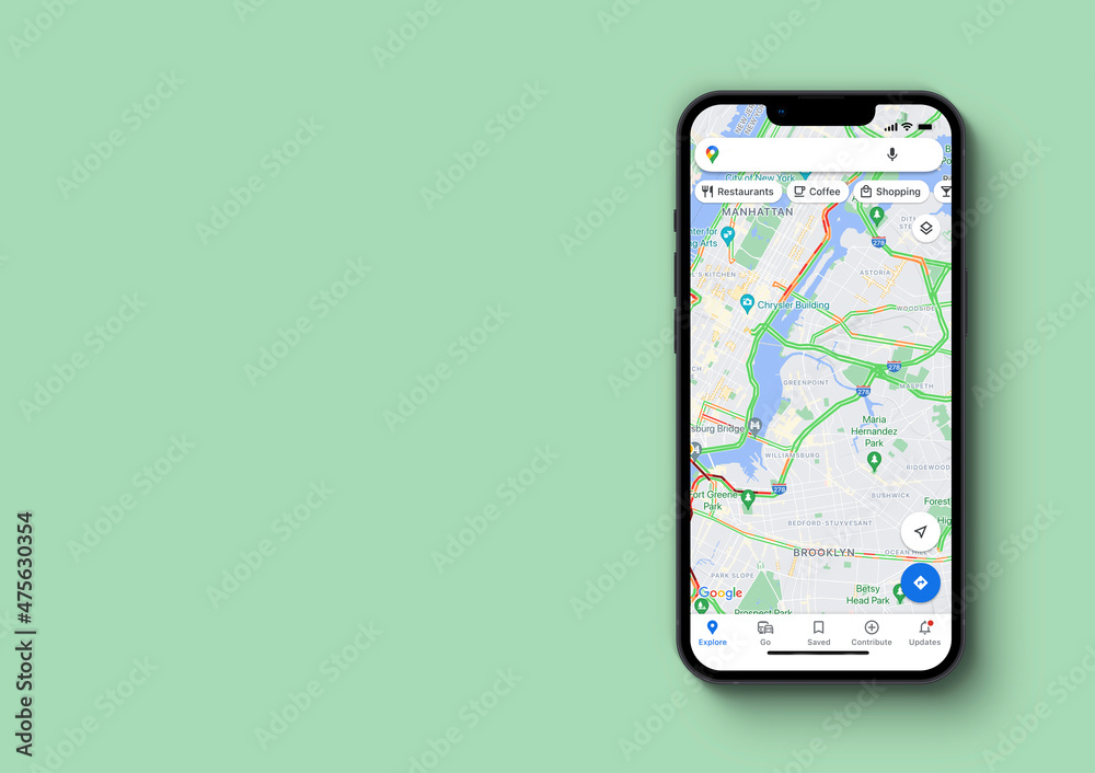 Google Maps app on the smartphone iPhone 13 screen. Green background ...