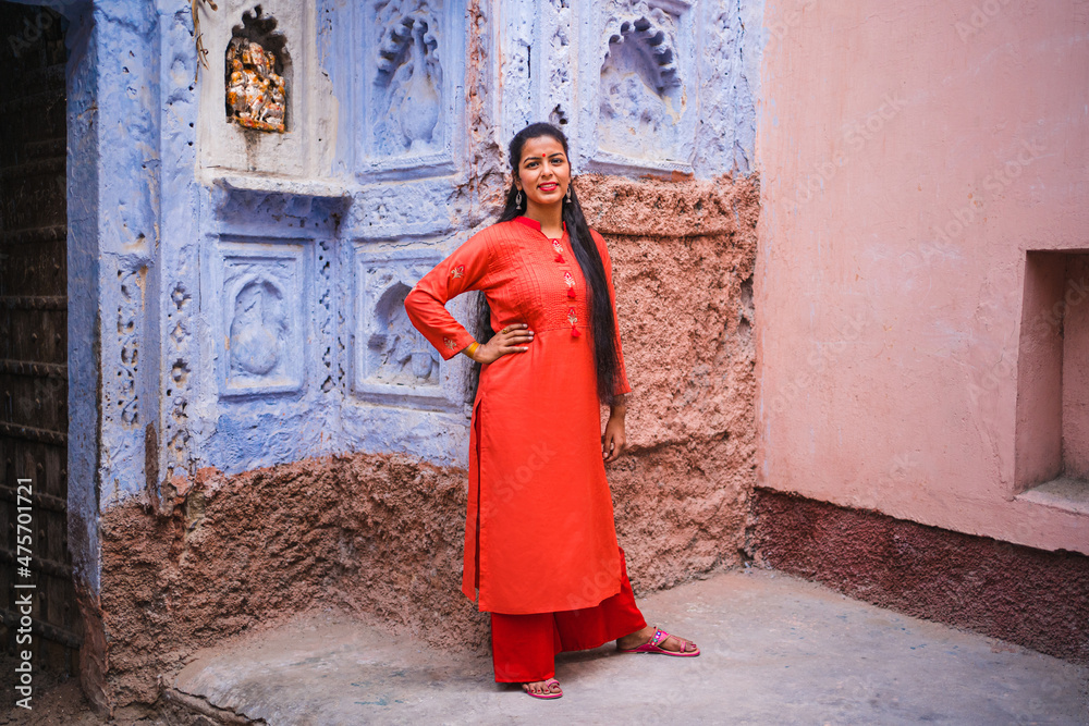 Beautiful Indian female model at blue district of the old city in ...
