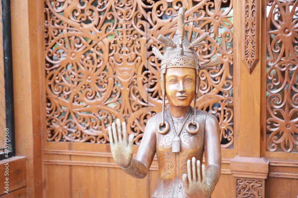 Indonesian Kalimantan Dayak tribe building, carved wood with ...