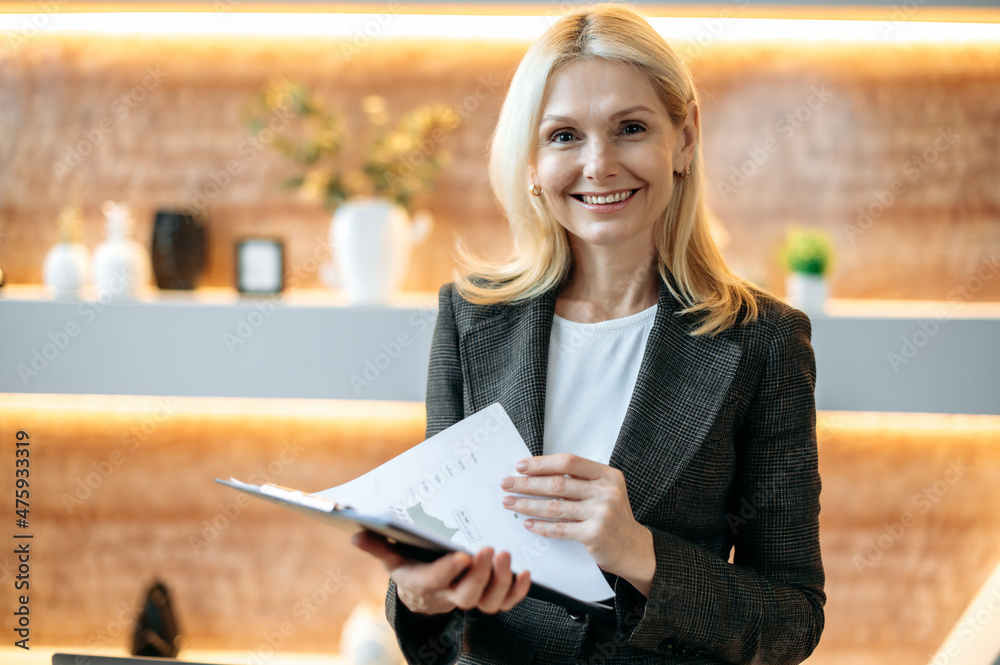 Successful, pretty, elegant mature caucasian business lady or manager ...