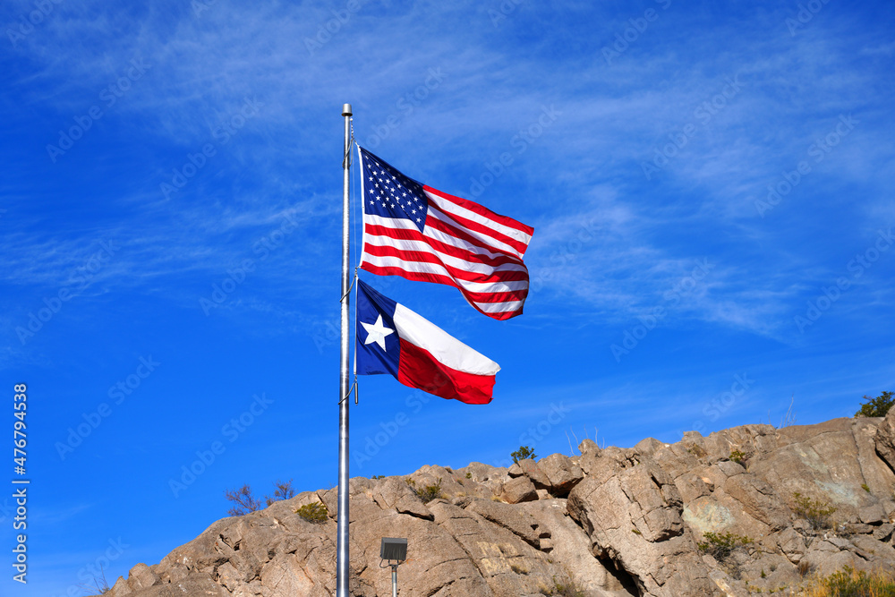 Flags of the USA and Texas flying on a mast Stock Photo | Adobe Stock