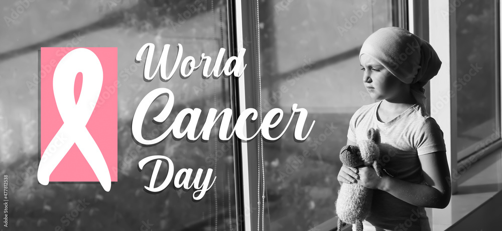Sad little girl after course of chemotherapy near window in clinic ...