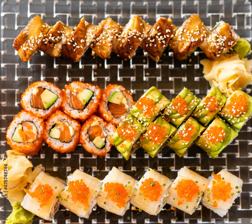 Foto Overhead japanese sushi food. Maki ands rolls with tuna, salmon ...