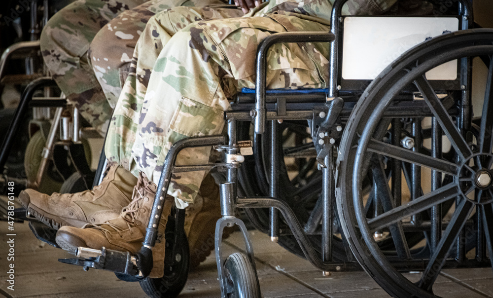 Military Servicemember in a Wheelchair Stock Photo | Adobe Stock