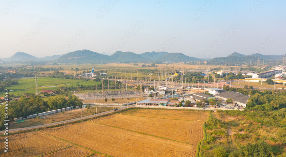 Aerial view of electricity generating, voltage poles. Power lines on ...