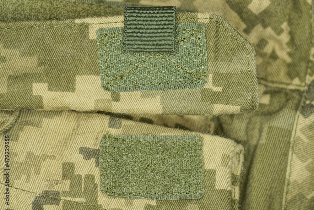 green velcro on the spotted fabric of the army clothing pocket Stock ...