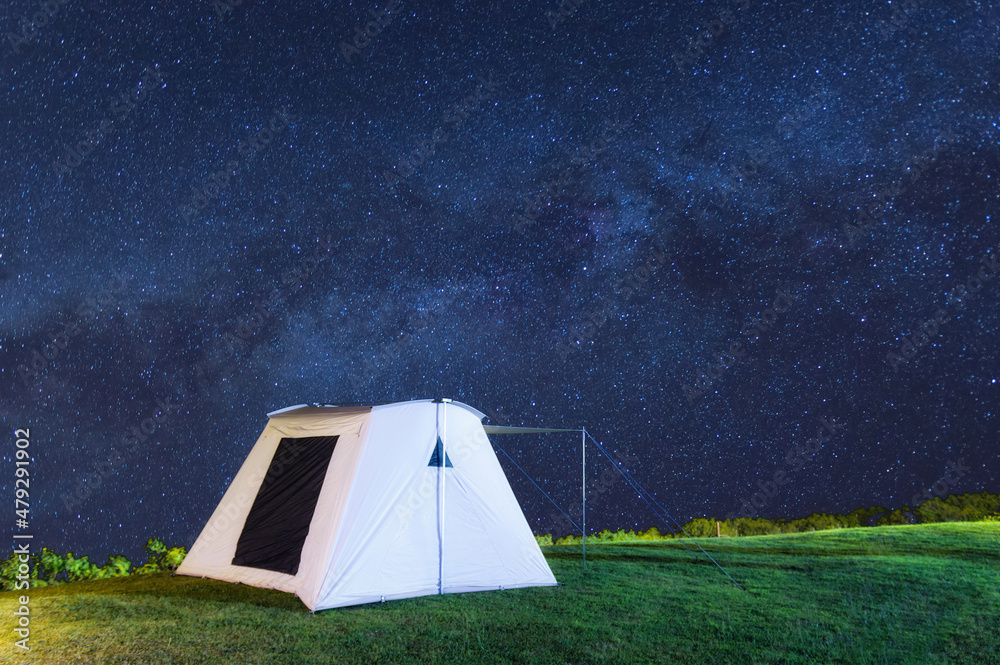 Beautiful tent camping at night. There are beautiful milky way galaxy ...