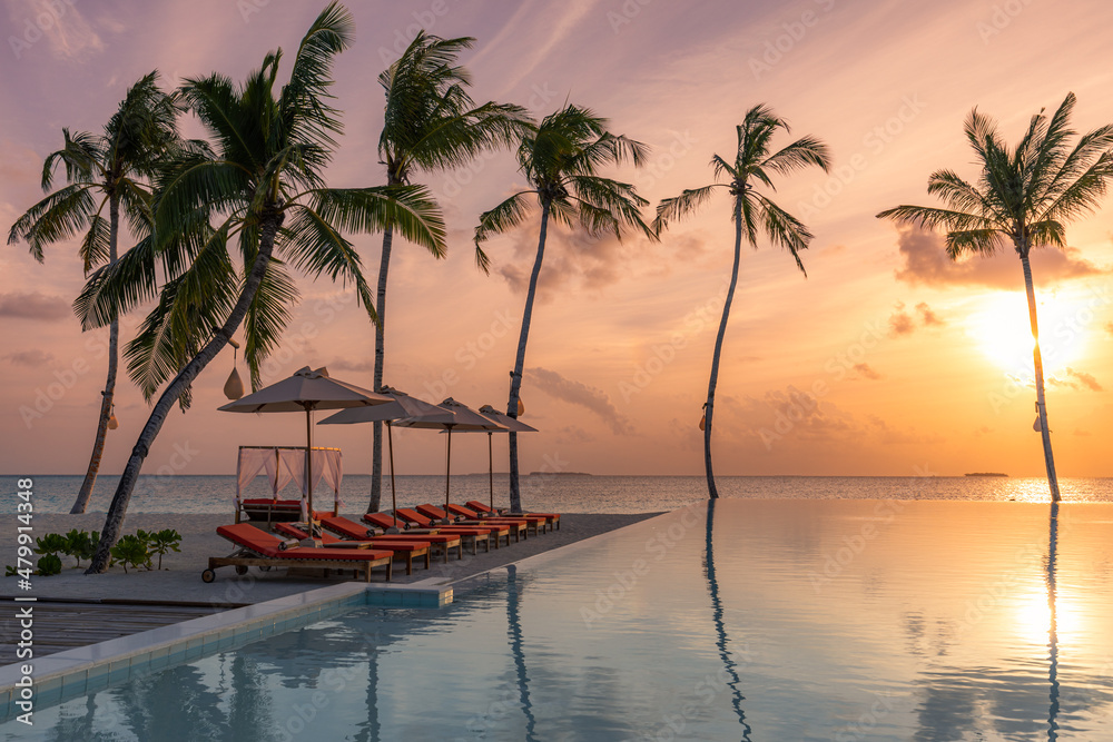 Fantastic poolside, sunset sky, palm trees reflection. Luxury tropical ...